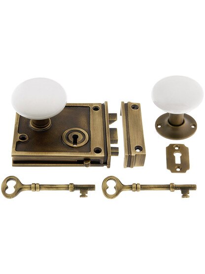 Solid Brass Horizontal Rim Lock Set with White Porcelain Knobs | House ...